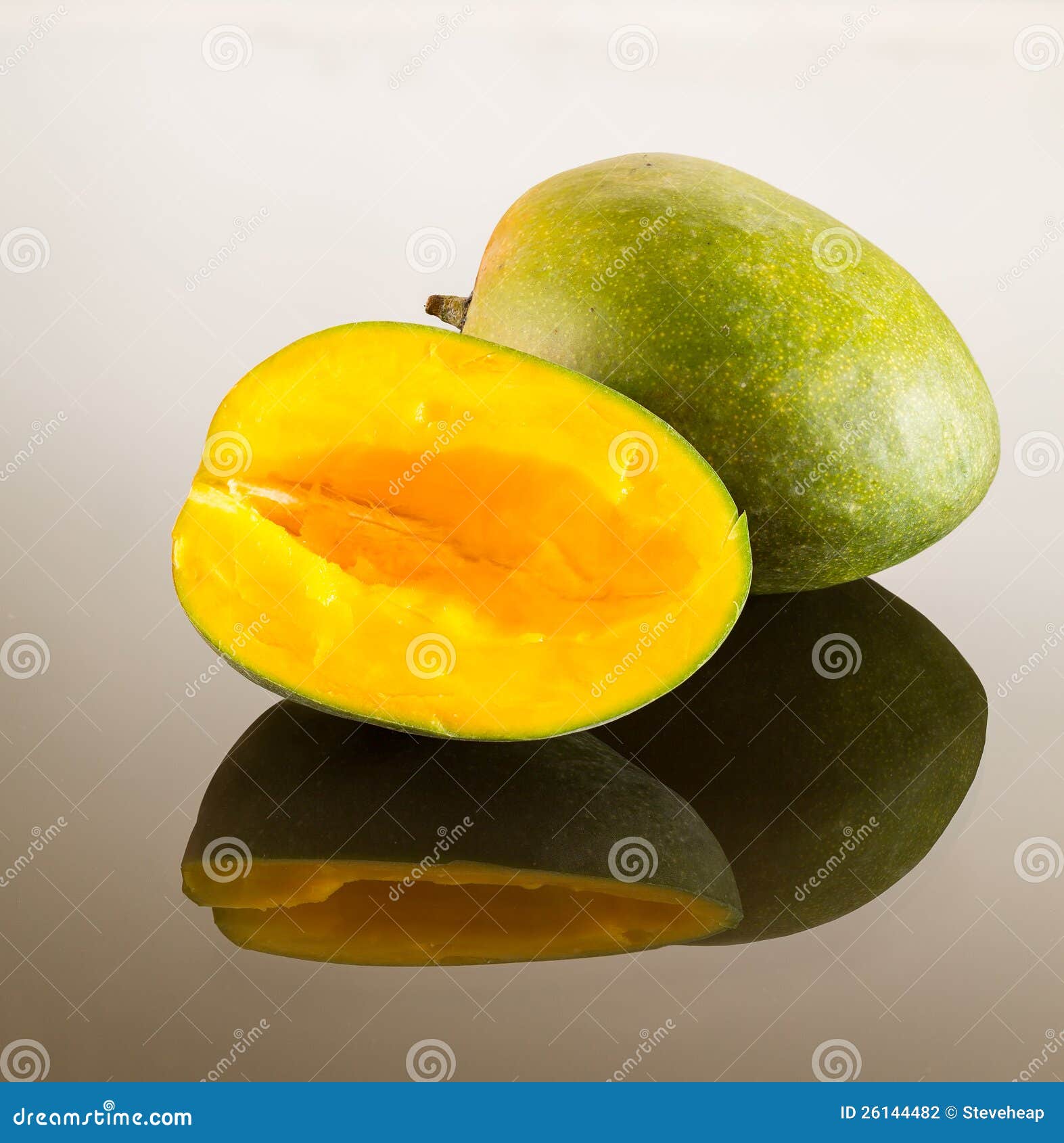 Two Mangoes on Reflecting Surface Stock Photo - Image of nutrition ...