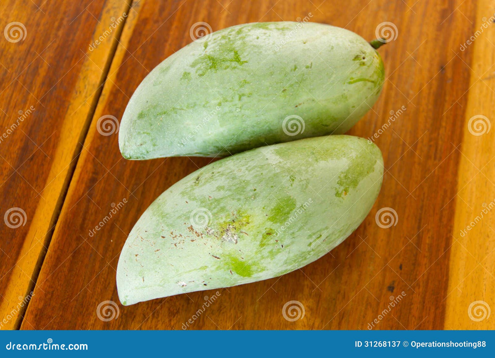 Two Mangoes on Wooden Table Stock Image - Image of natural, orange ...