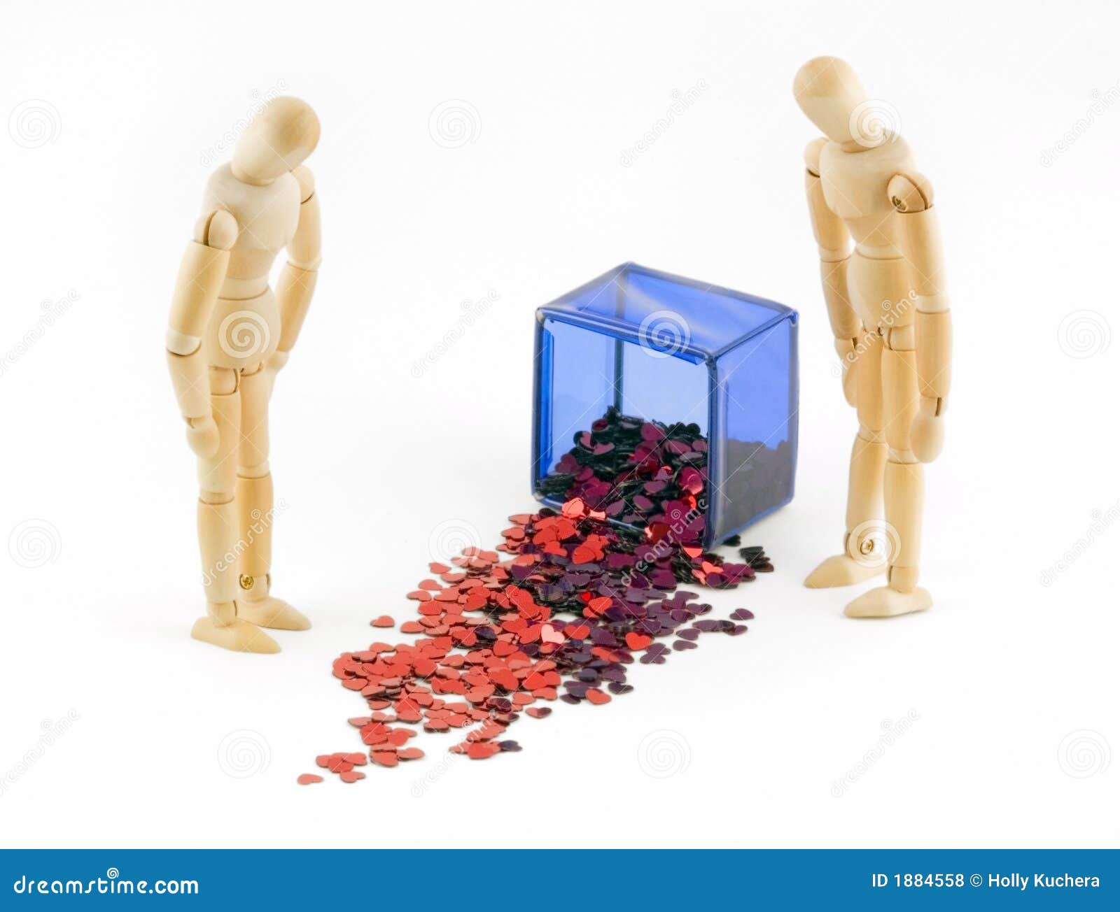 Two Mannequins Look at Spilled Box of Hearts Stock Photo - Image of ...