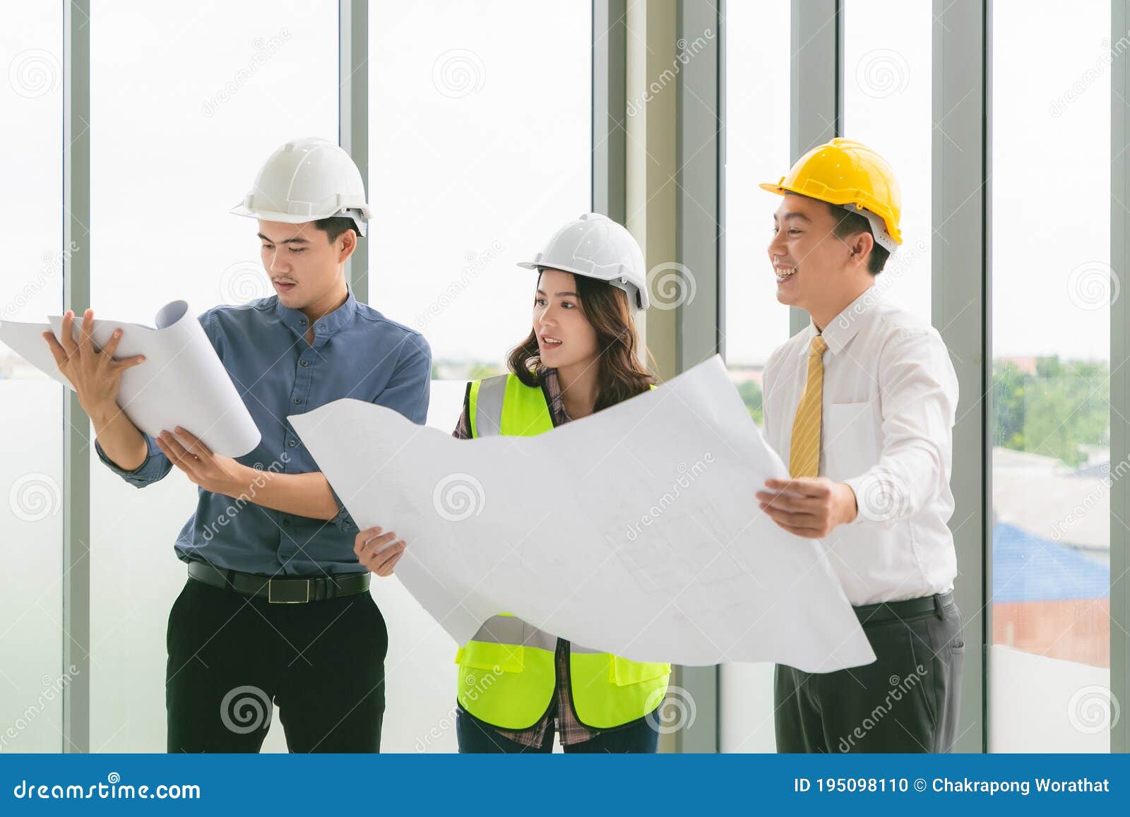 Two Mans Inspectors and Architects Discuss with Head Engineer about ...