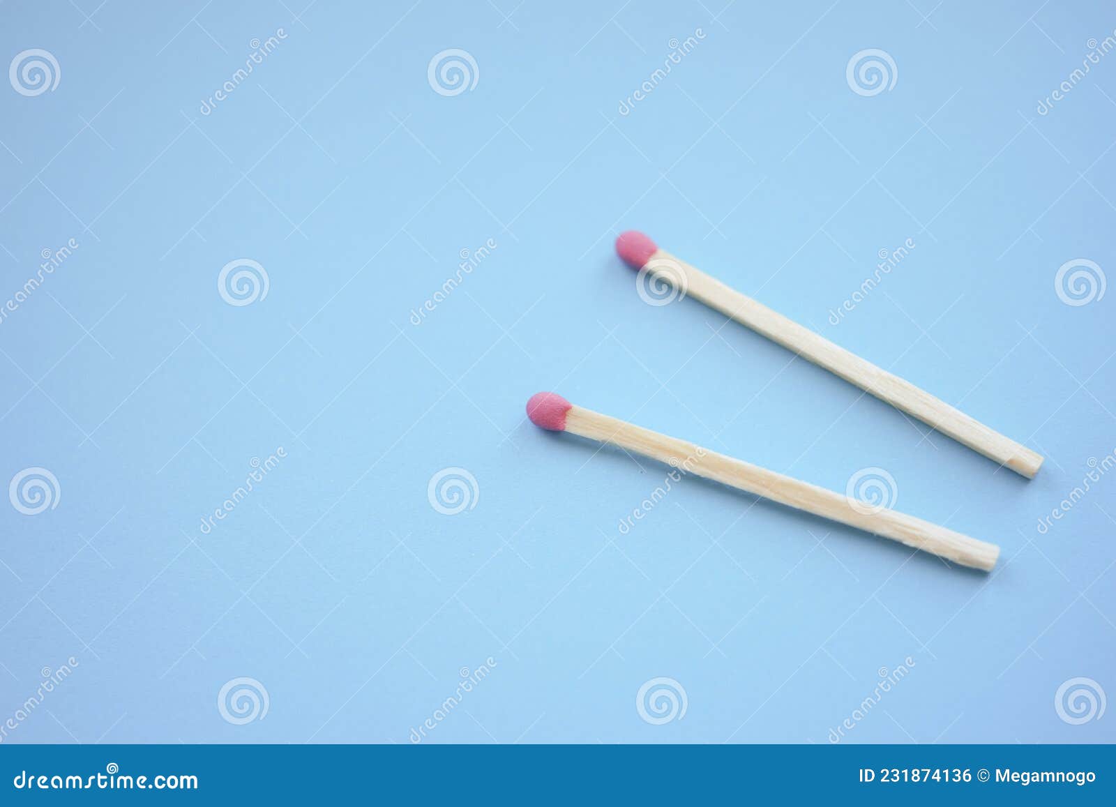 Two Matches on a Blue Paper Table Stock Photo - Image of stick, pink ...