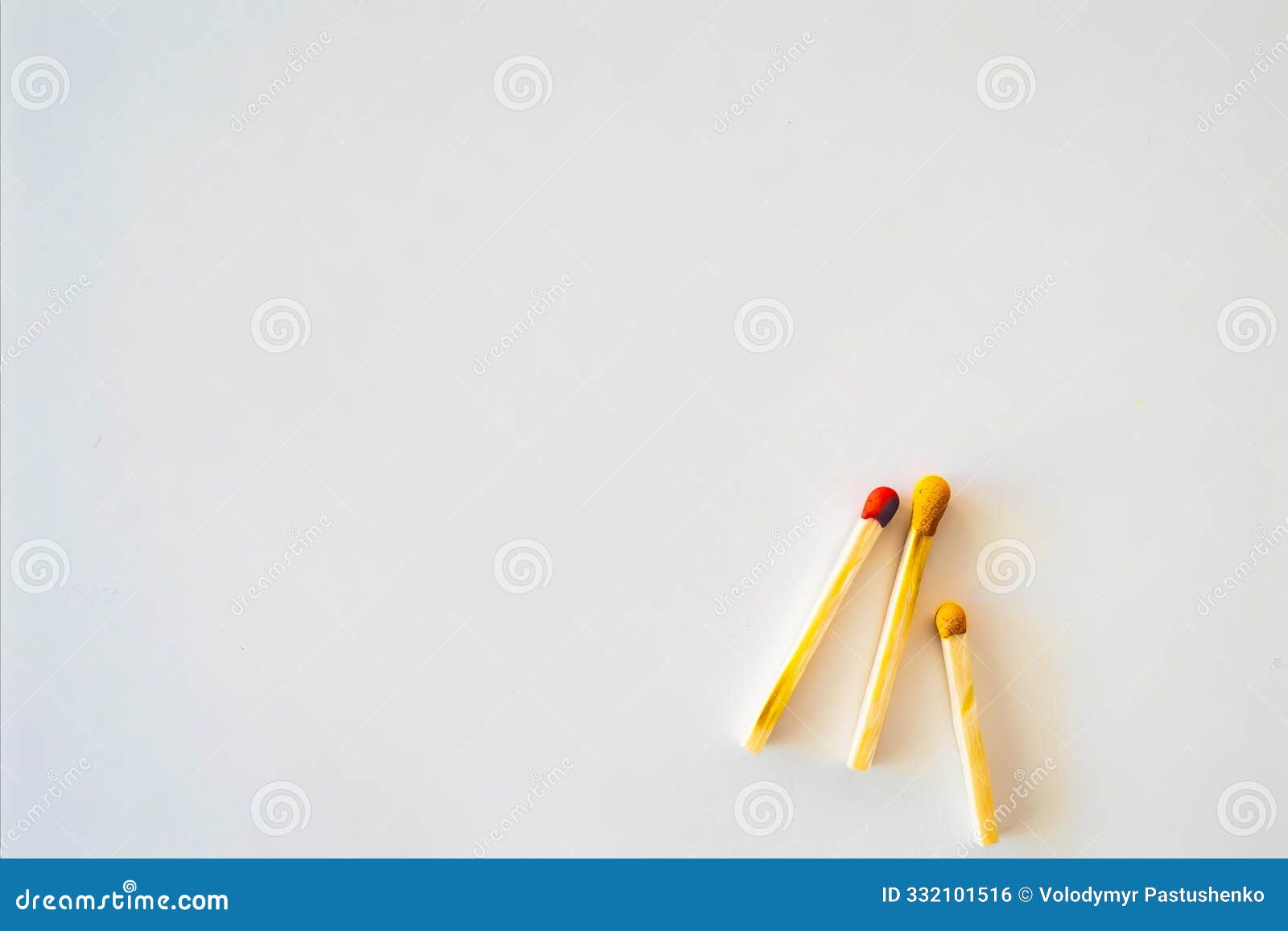 Two Matches are Laying Next To Each Other on a White Surface Stock ...