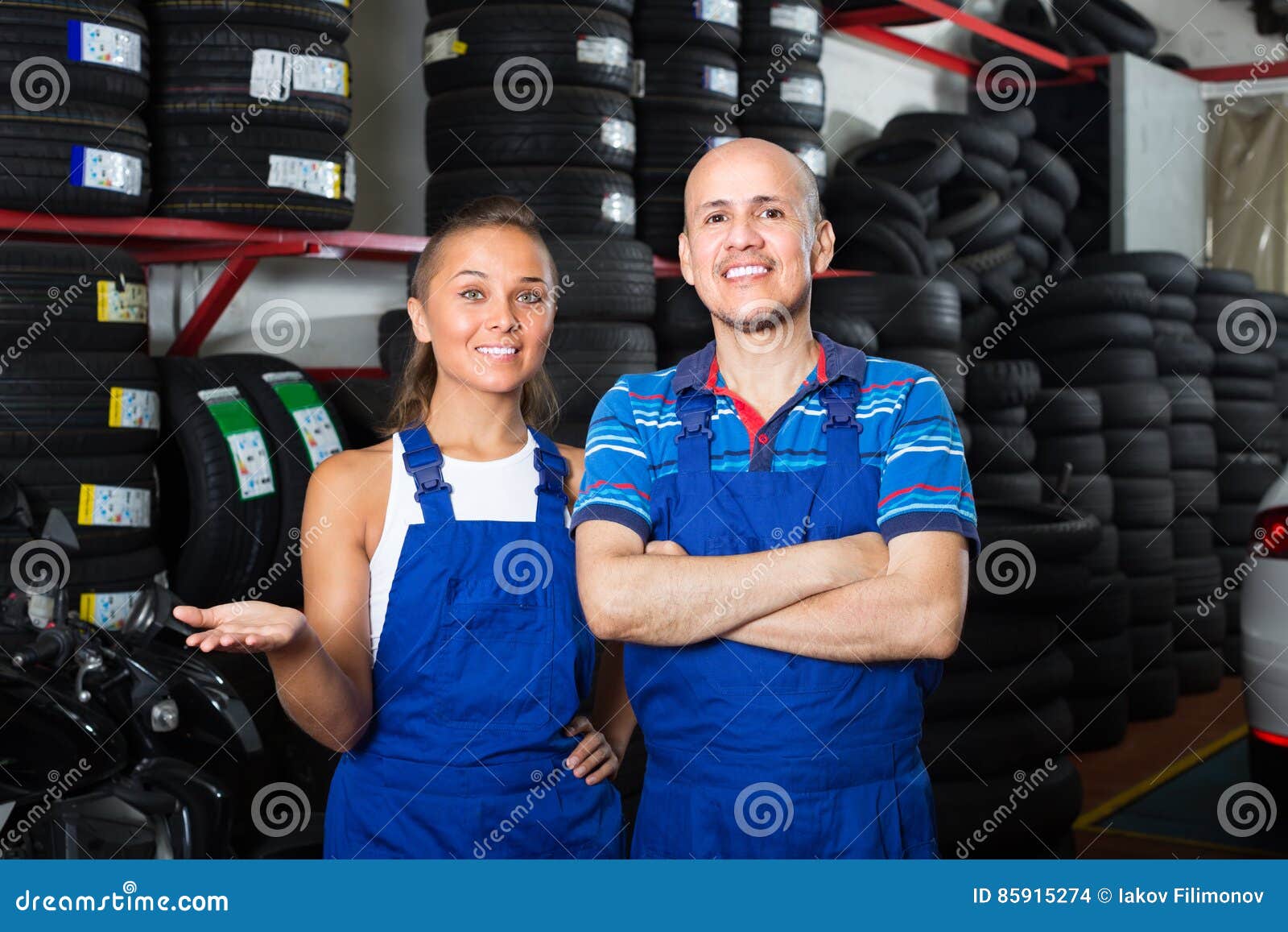 Two Mechanics in Car Fixing Workshop Stock Photo - Image of garage ...