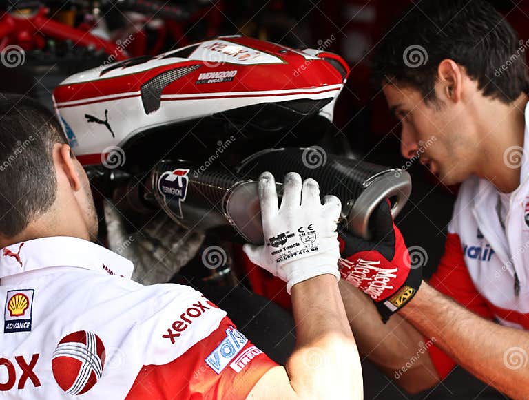 Two Mechanics Change the Exhaust Pipe Editorial Stock Image - Image of ...