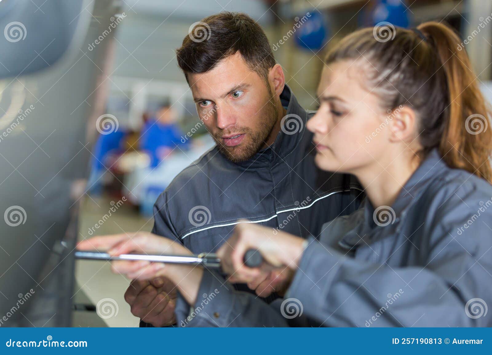 Two Mechanics Operating Wheel Equilibrium Control Machinery Stock Image ...