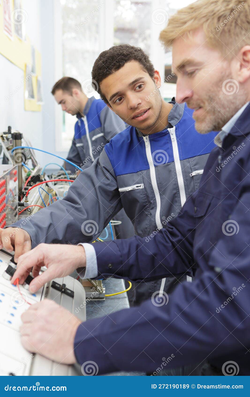 Two Mechanics Testing Car Battery Stock Image - Image of person ...