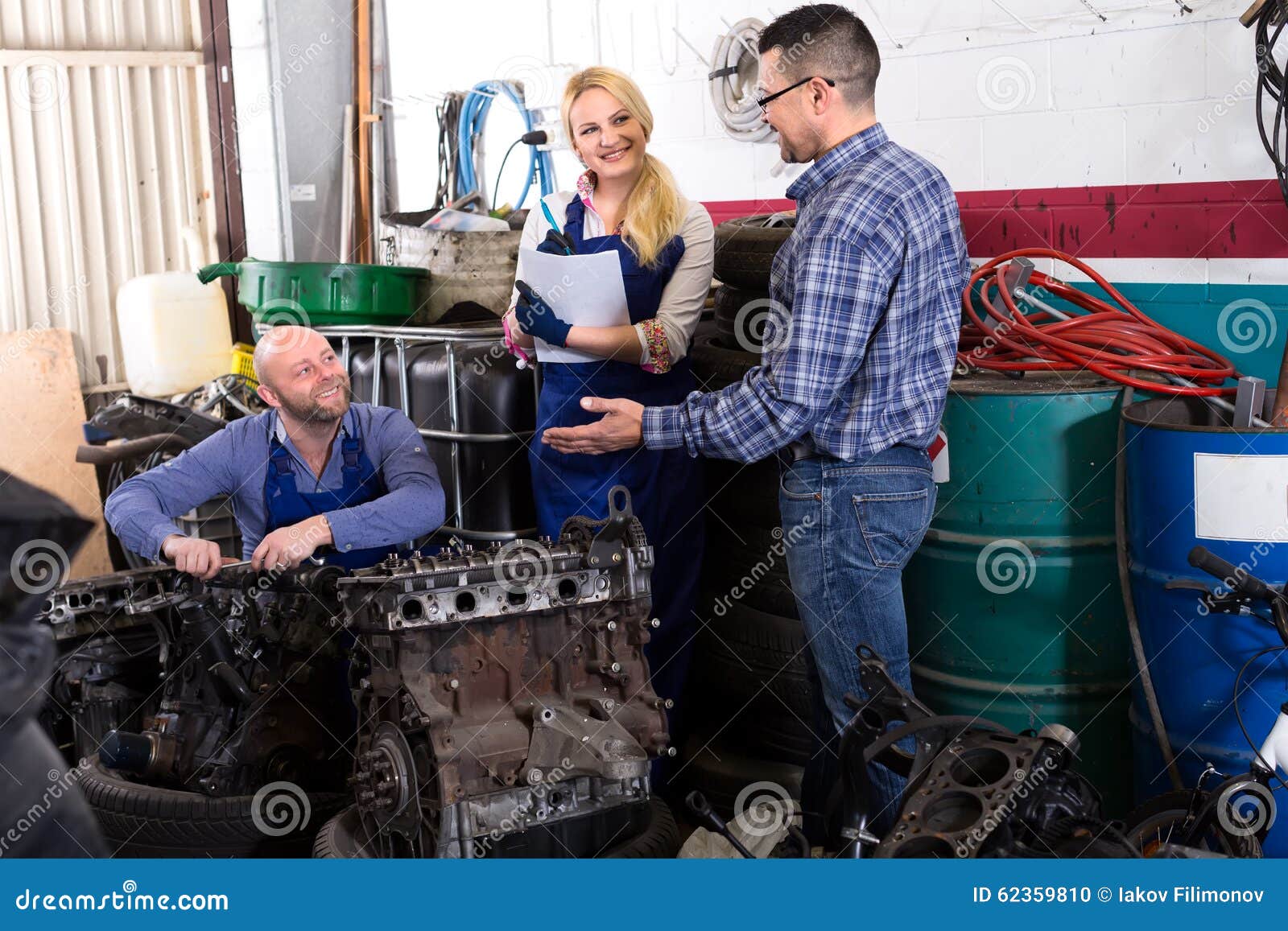 Two Mechanics and Their Manager Stock Photo - Image of automobile ...