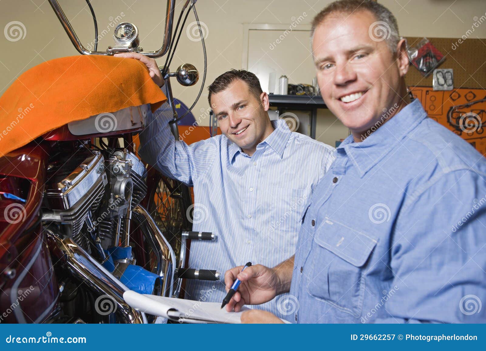 Two Mechanics at Work stock image. Image of male, casual - 29662257