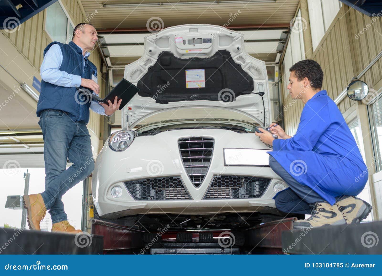 Two Mechanics Working on Car Stock Image - Image of technician ...