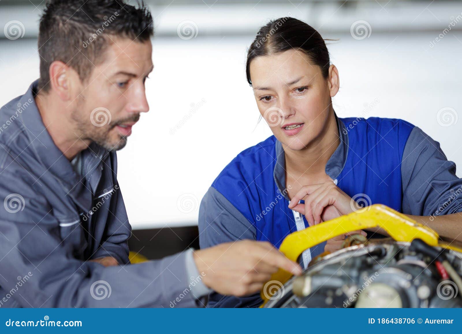 Two Mechanics Working on Car Stock Photo - Image of dealer, people ...