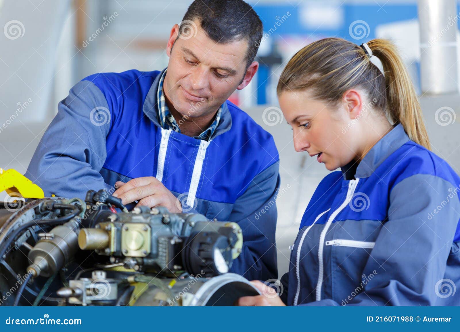 Two Mechanics Working in Workshop Stock Photo - Image of teamwork ...