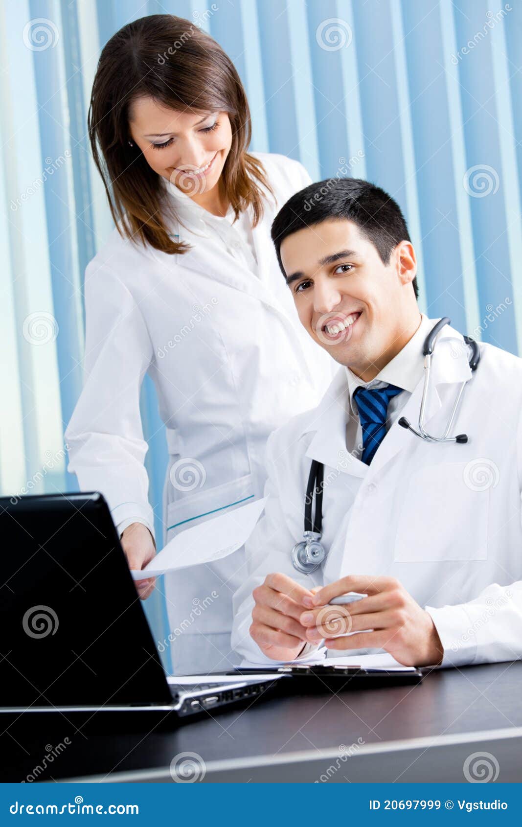 Two Medical People at Office Stock Image - Image of people, document ...