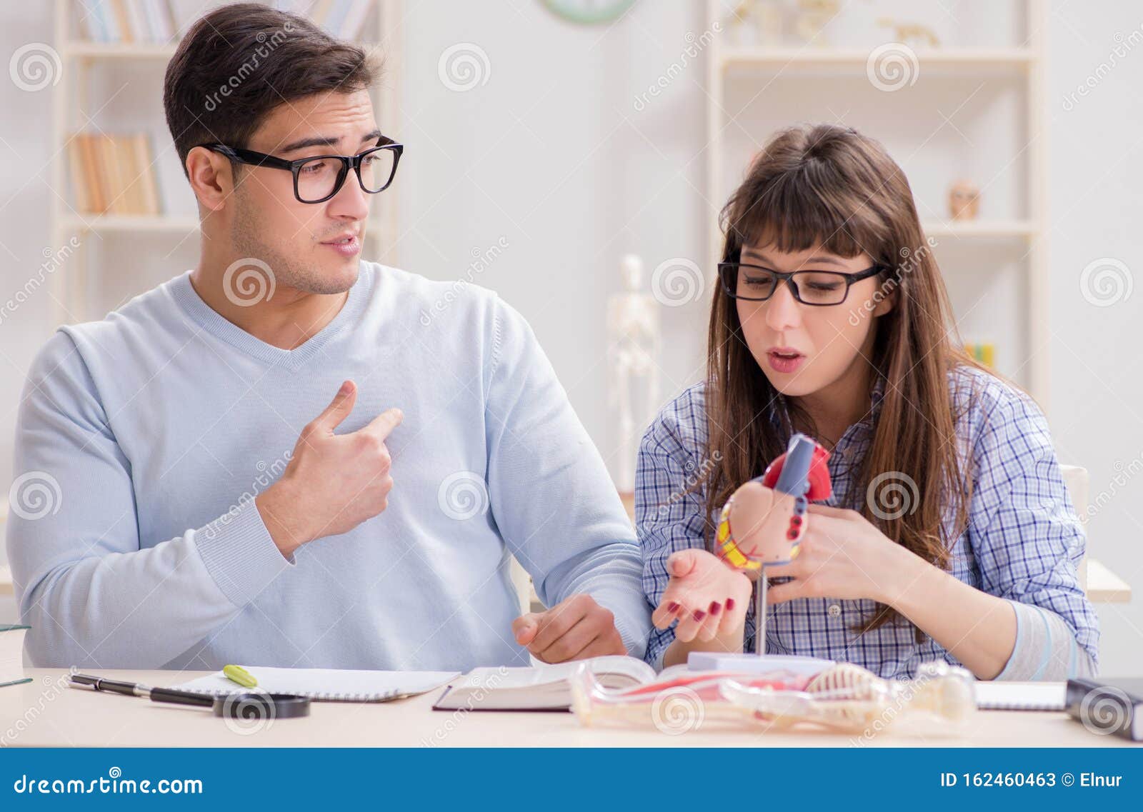 Two Medical Students Studying in Classroom Stock Image - Image of ...