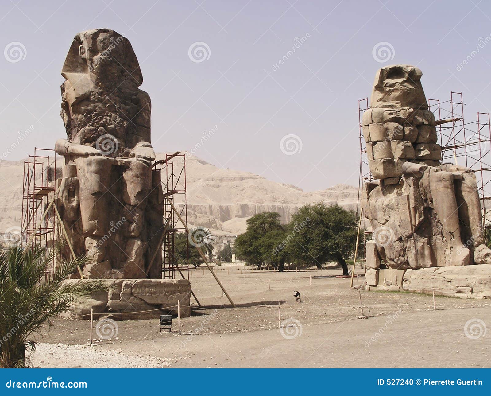 Memnon Colossi Statues Of The Pharaoh Amenhotep III In Luxor, Egypt ...