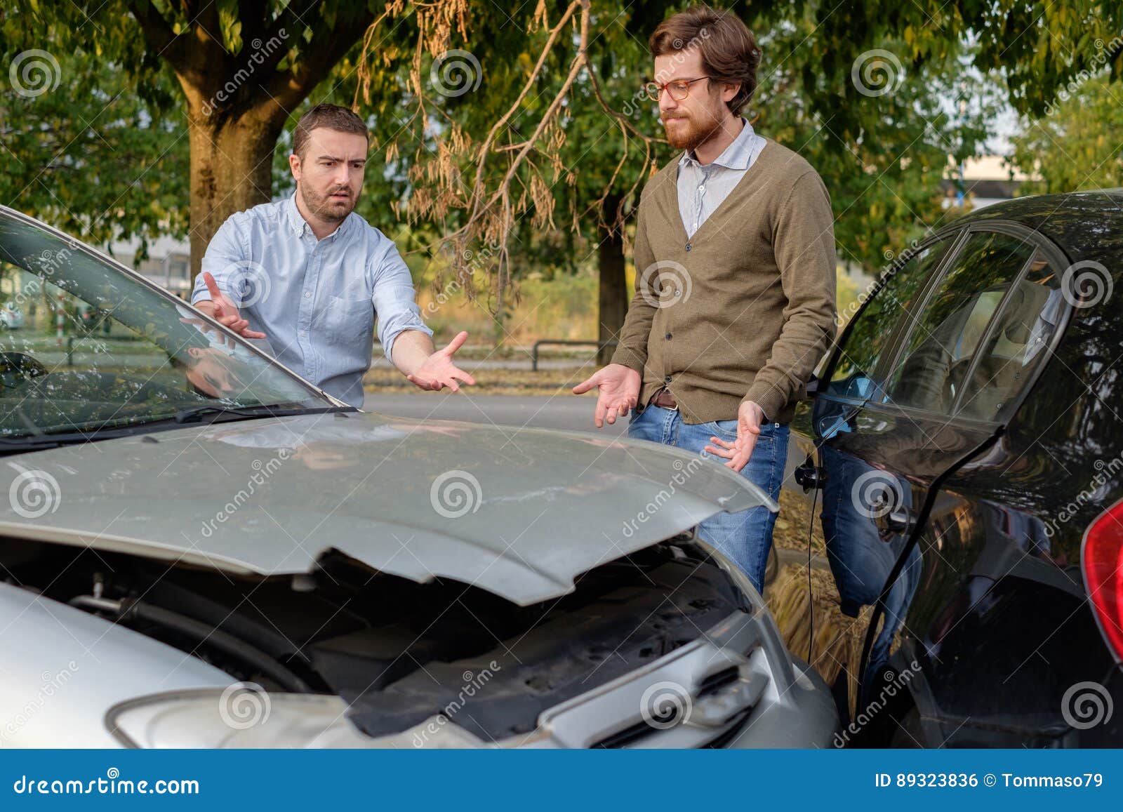 Two Men Arguing after a Car Accident on the Road Stock Photo - Image of ...