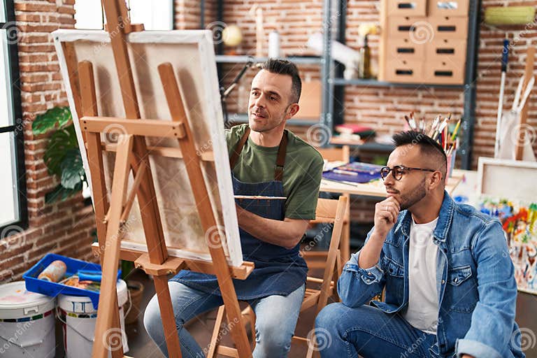Two Men Artists Drawing with Relaxed Expression at Art Studio Stock ...