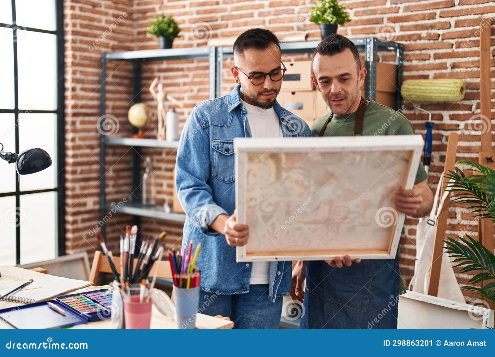 Two Men Artists Looking Draw with Relaxed Expression at Art Studio ...