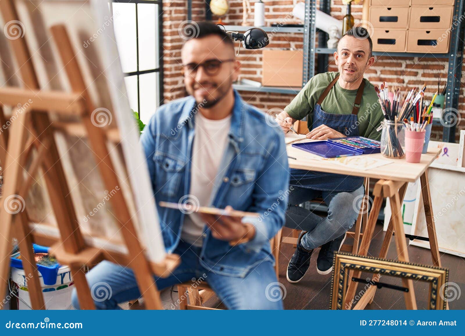 Two Men Artists Smiling Confident Drawing at Art Studio Stock Photo ...