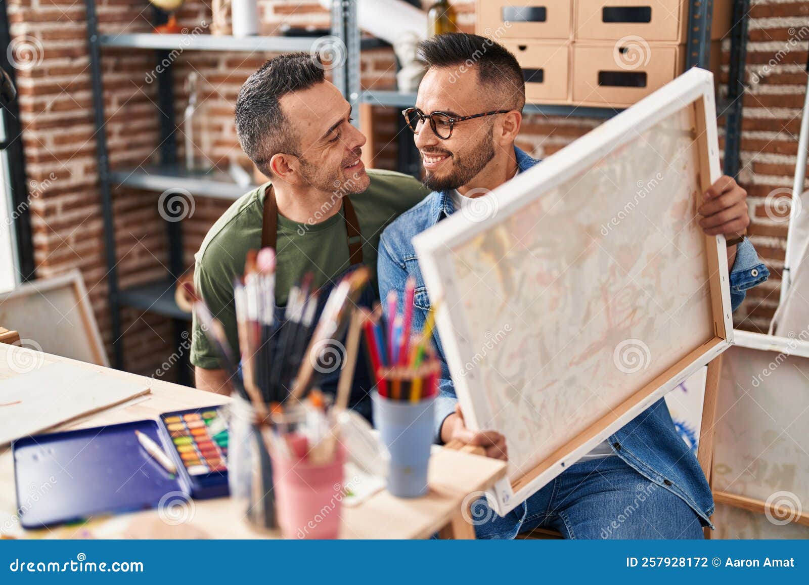 Two Men Artists Smiling Confident Looking Draw at Art Studio Stock ...