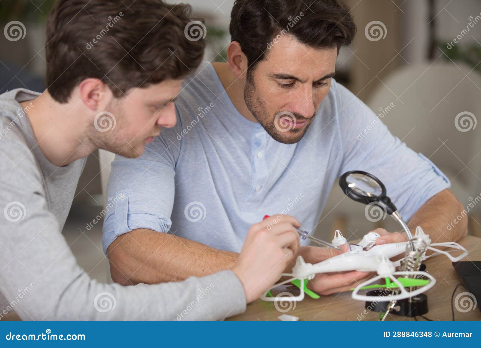 Two Men Assembling Components Drone Stock Photo - Image of product ...