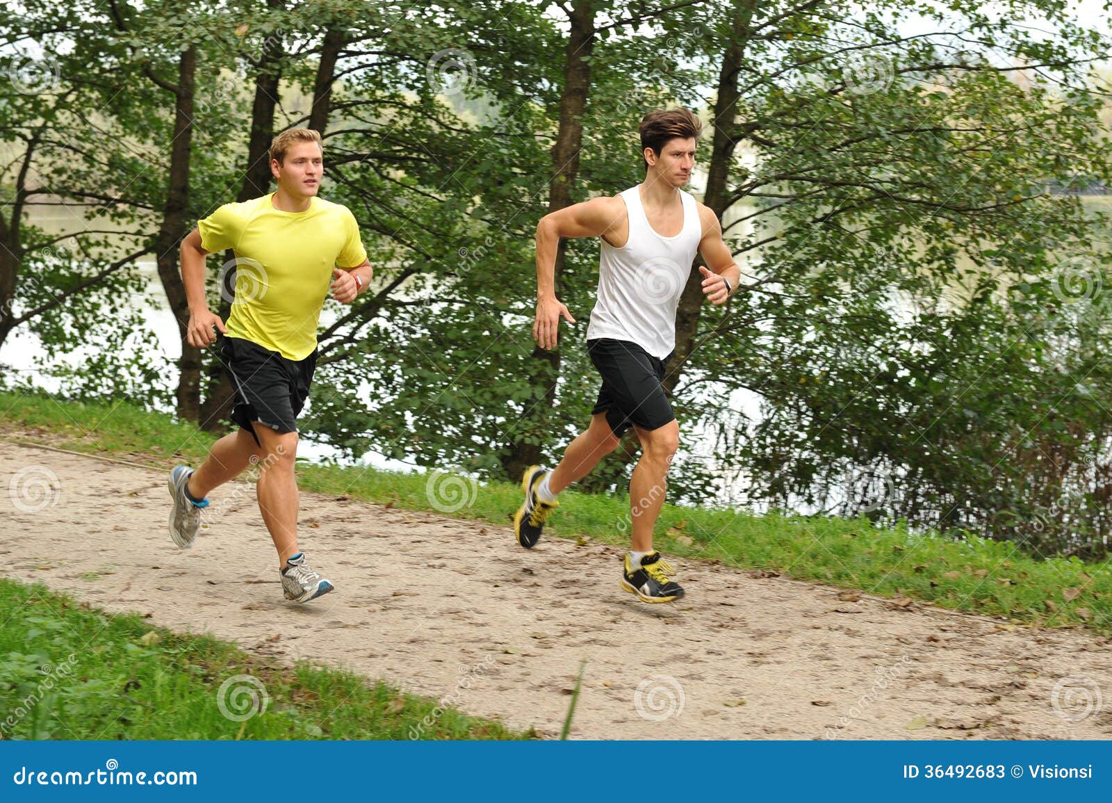 Two Men Athletes Running through Park Stock Image - Image of horizontal ...