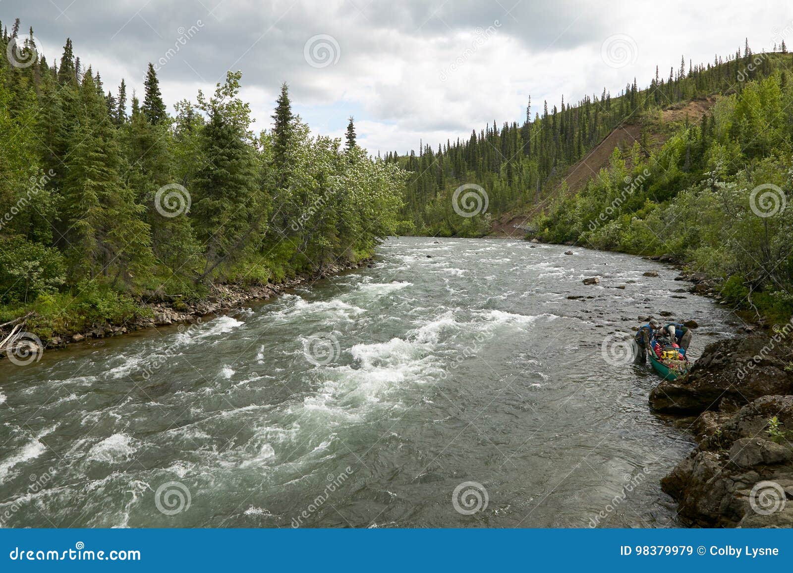 An Alaskan River Runs Through A Gravel Flat Royalty-Free Stock ...