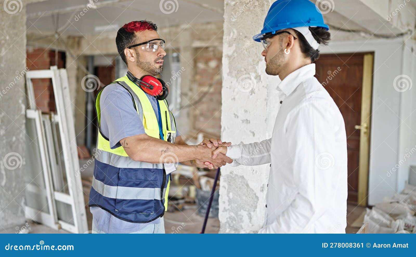 Two Men Builder and Architect Shake Hands with Relaxed Expression at ...