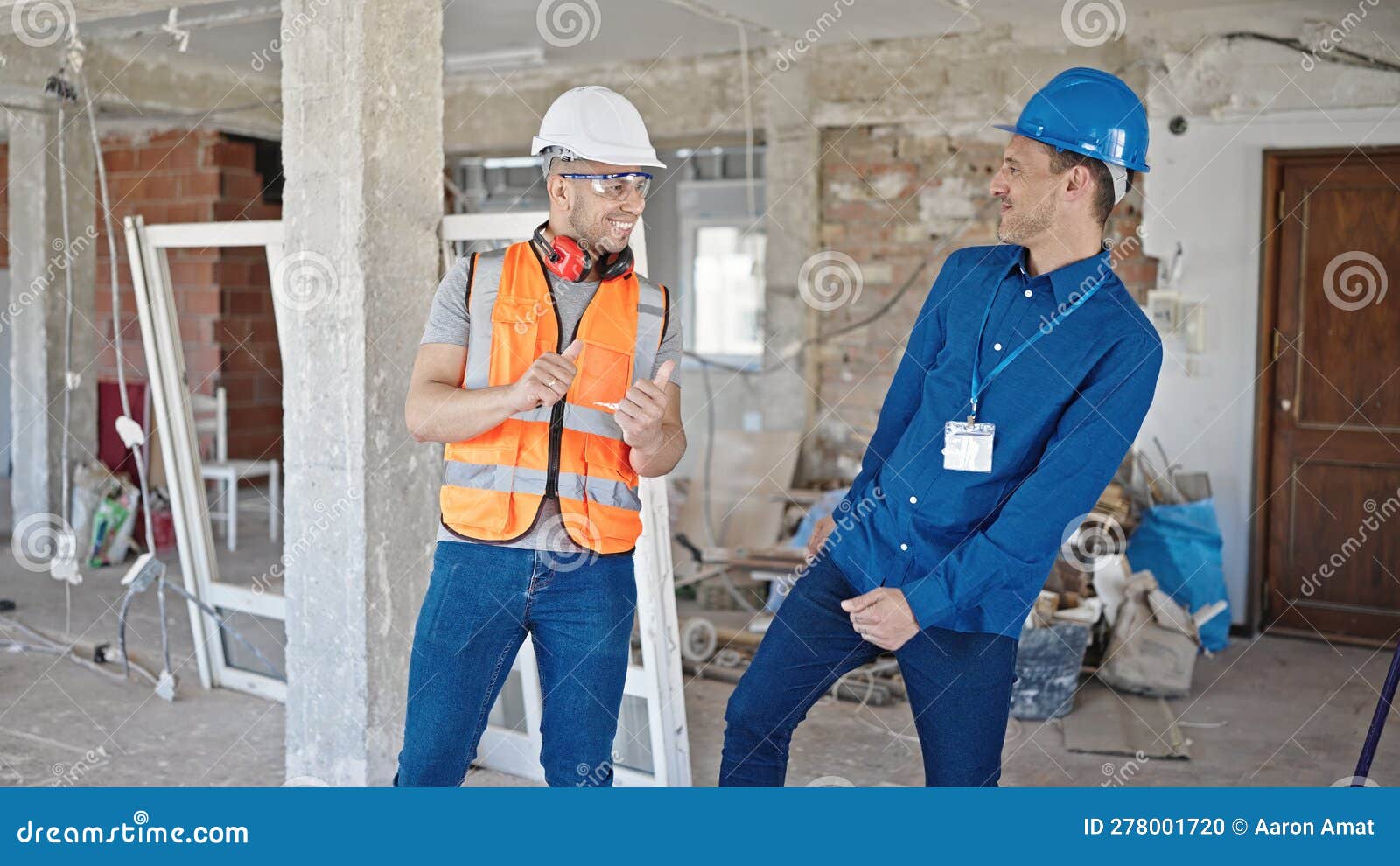 Two Men Builder and Architect Smiling Confident Dancing at Construction ...