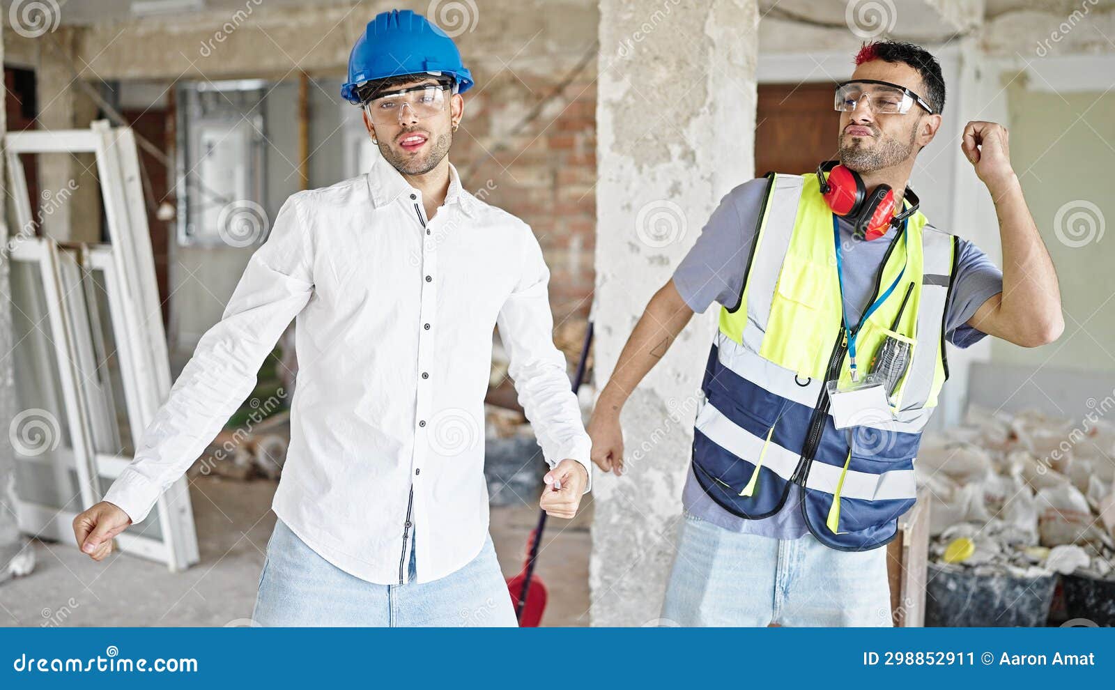Two Men Builder and Architect Smiling Confident Dancing at Construction ...