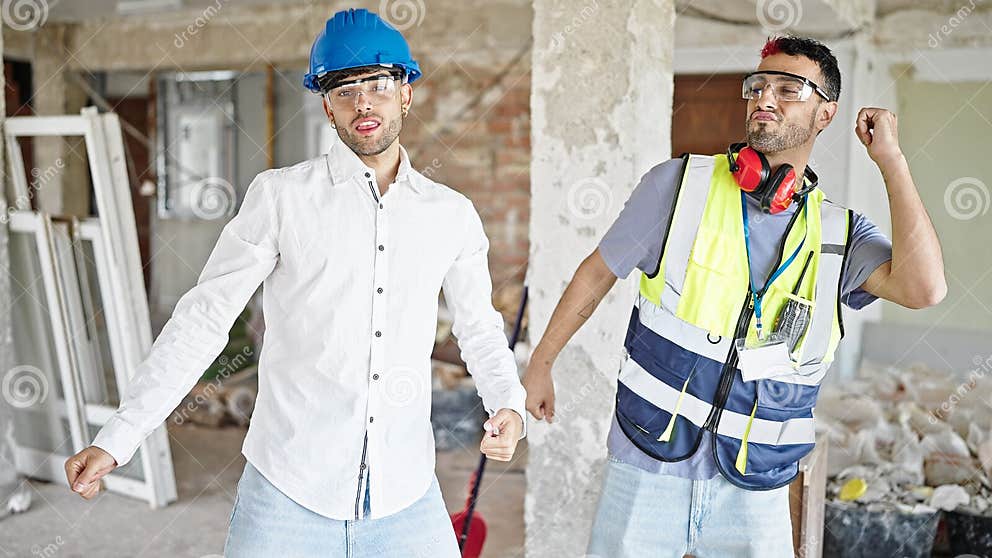 Two Men Builder and Architect Smiling Confident Dancing at Construction ...