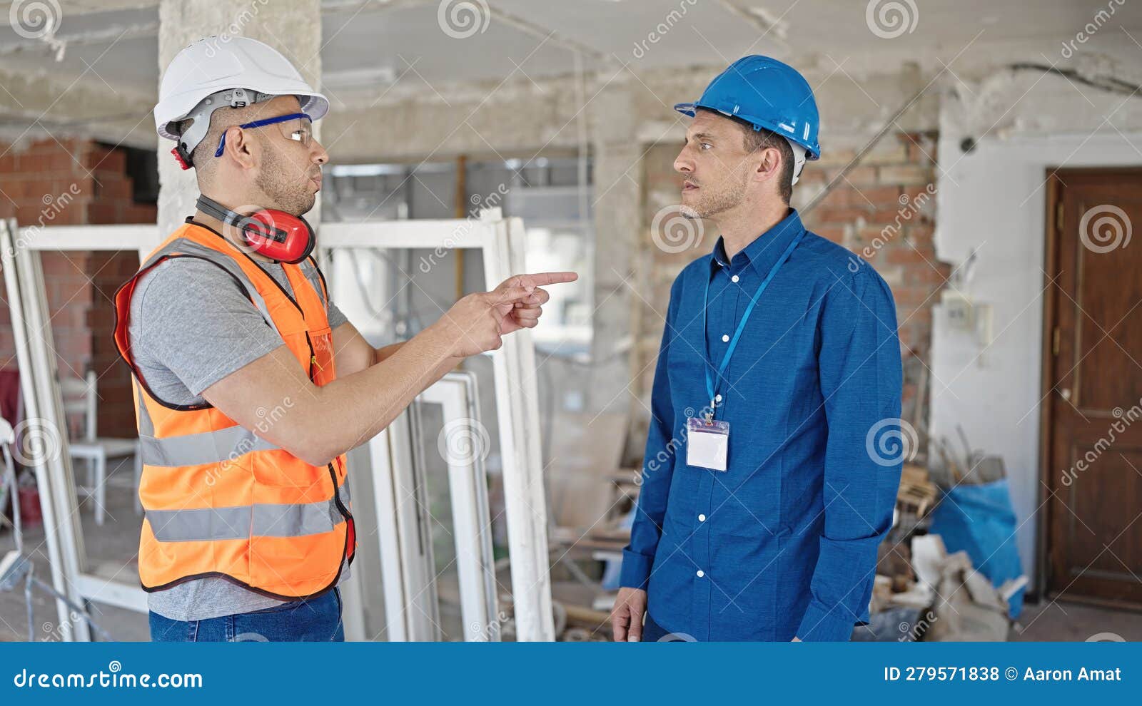 Two Men Builder and Architect Speaking at Construction Site Stock Photo ...