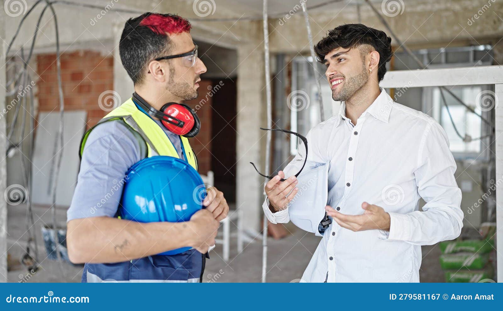 Two Men Builder and Architect Standing Together Speaking at ...