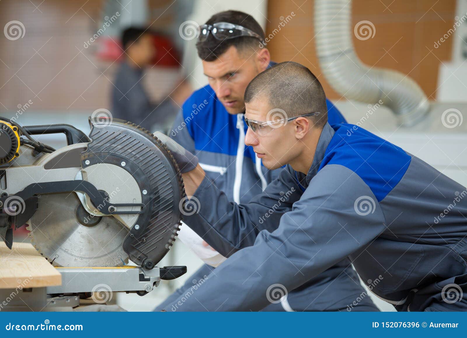 Two Men Builder with Circular Saw Having Conversation Stock Photo ...