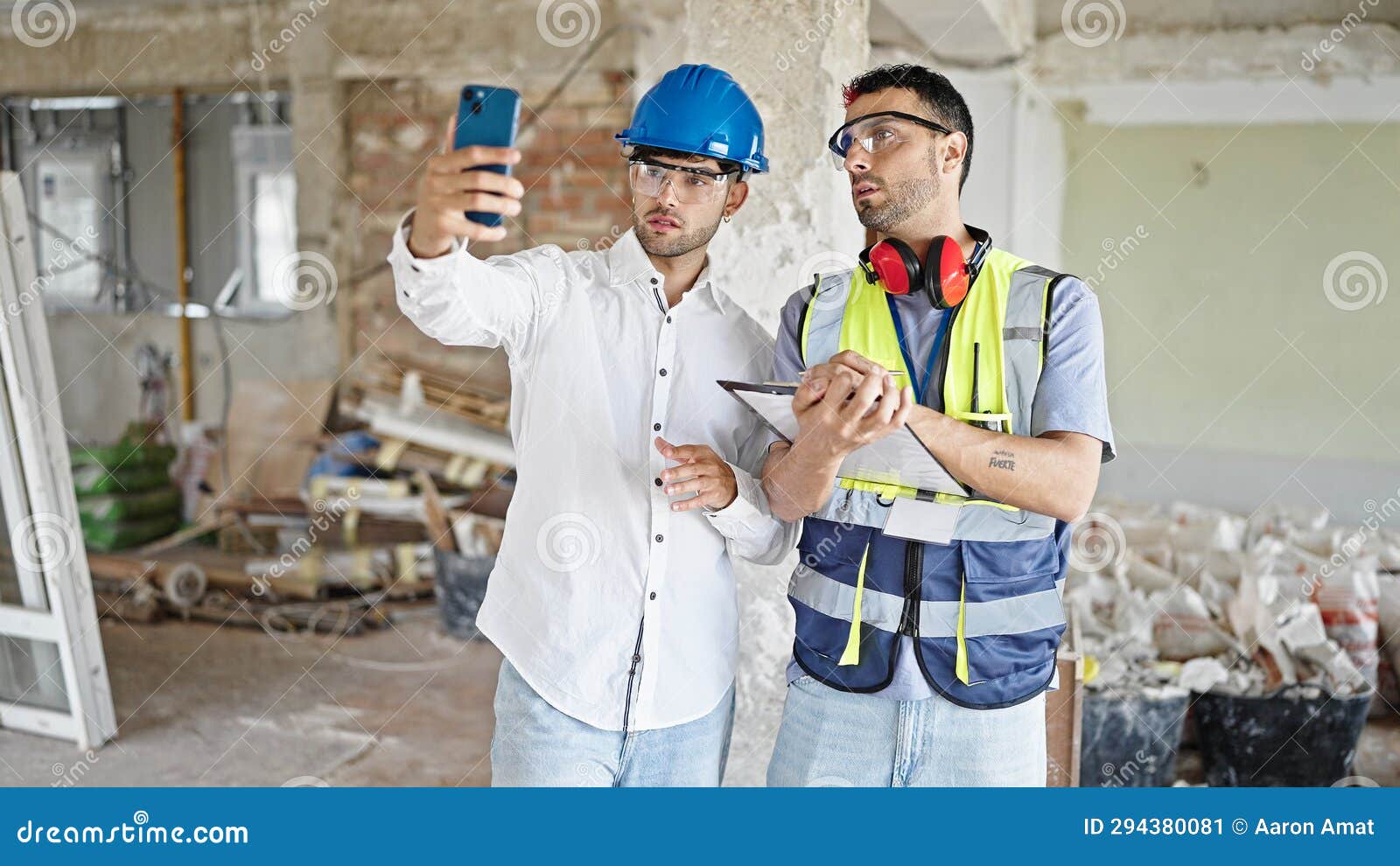 Two Men Builders and Architect Having Video Call Writing on Document at ...