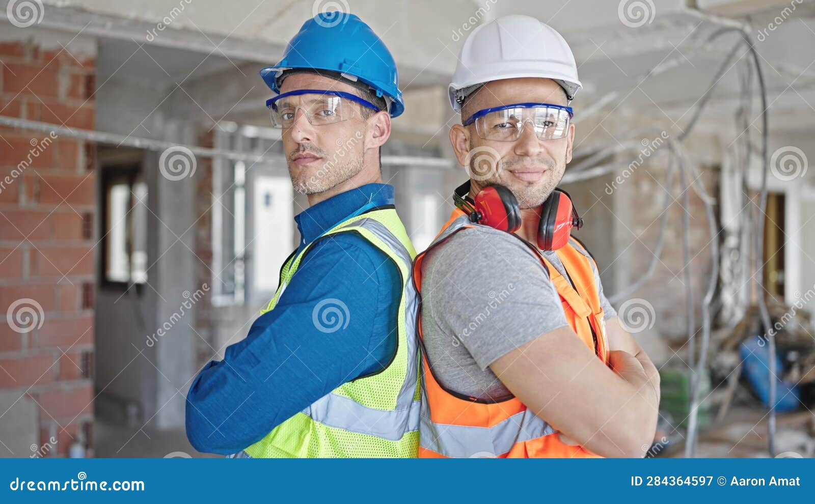 Two Men Builders Smiling Confident Standing with Arms Crossed Gesture ...