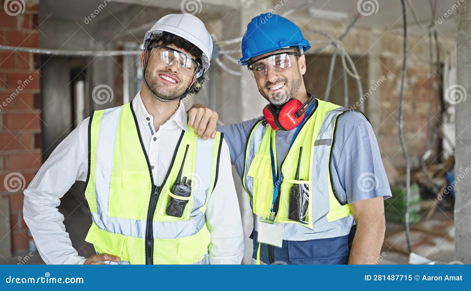 Two Men Builders Smiling Confident Standing at Construction Site Stock ...