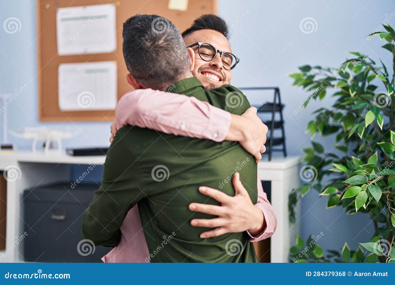 Two Men Business Workers Hugging Each Other at Office Stock Photo ...