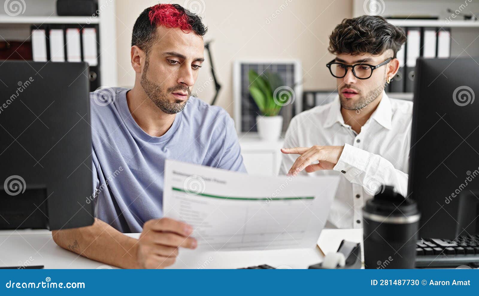 Two Men Business Workers Reading Document Working at Office Stock Photo ...