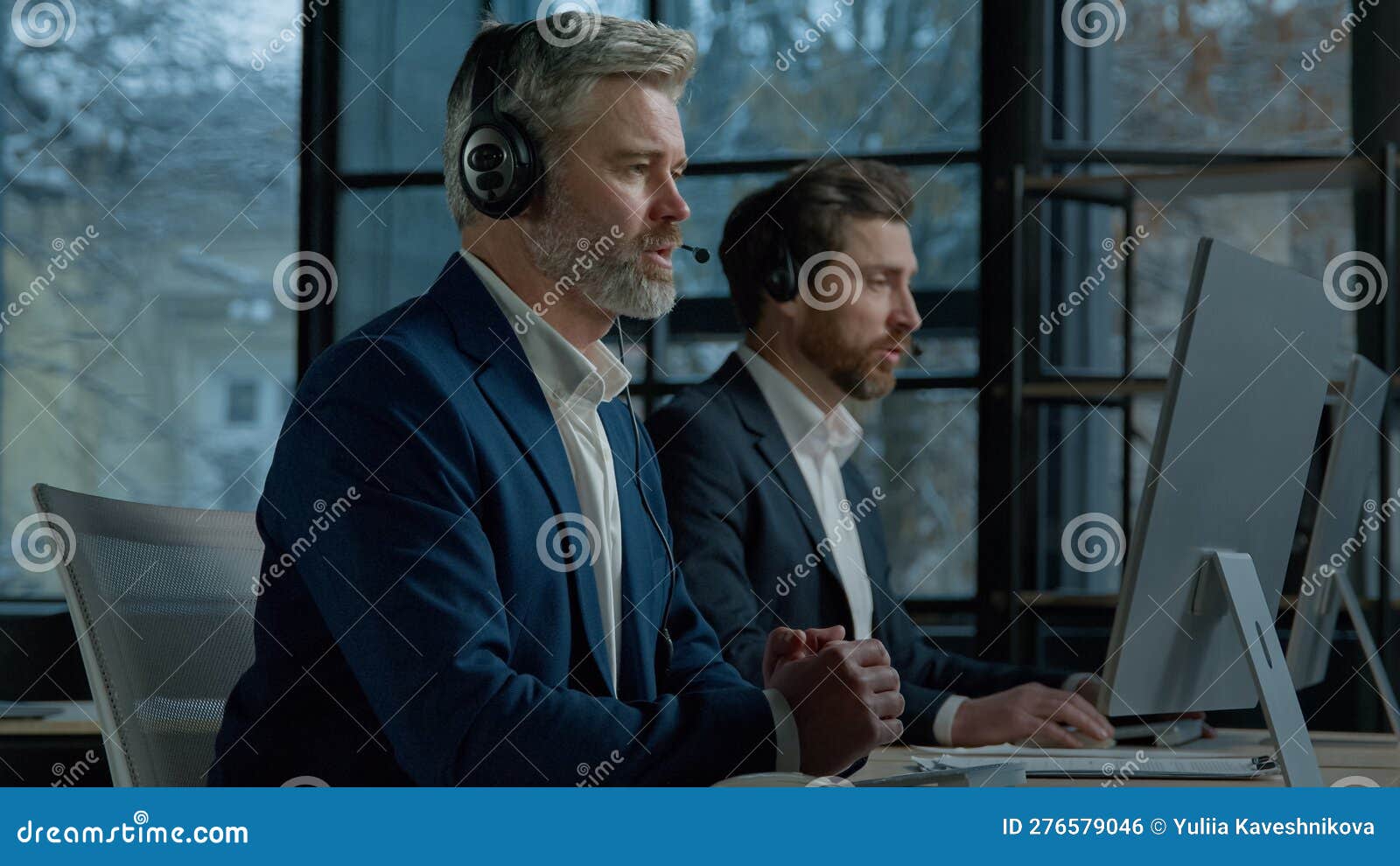 Two Men Call Center Service Operators Work in Office Talk To Client ...