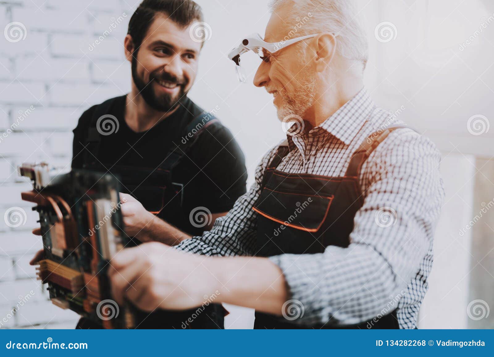 Two Men Checking Hardware Equipment from PC Stock Photo - Image of ...