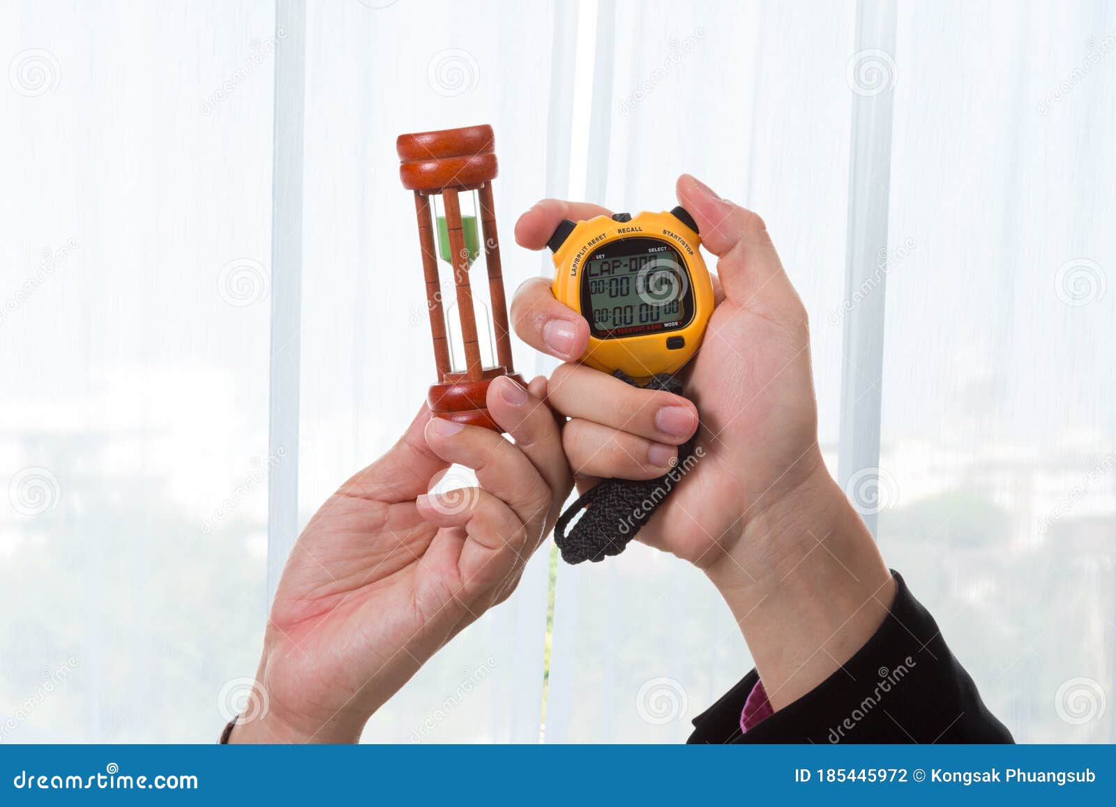 Two Men Checking Timer by Hourglass or Stop Watch Stock Photo - Image ...