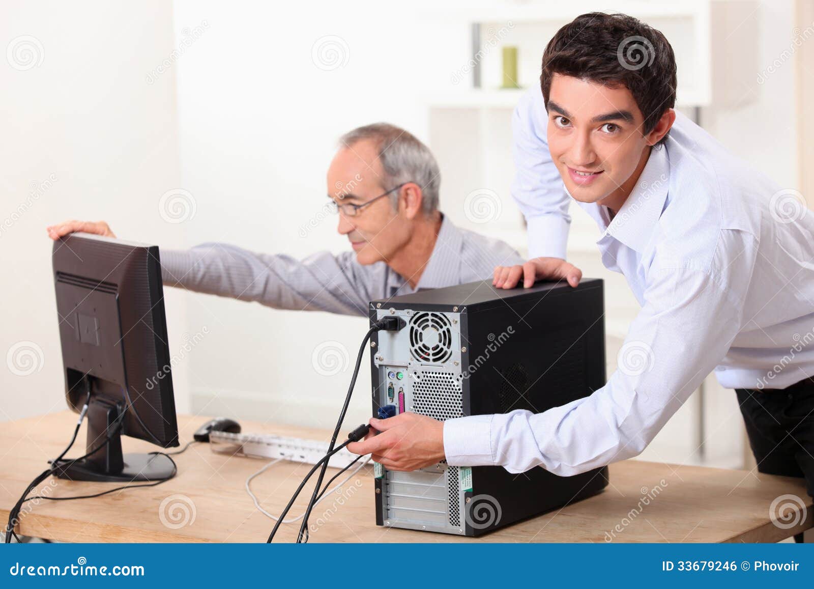 Two men with a computer stock photo. Image of computer - 33679246