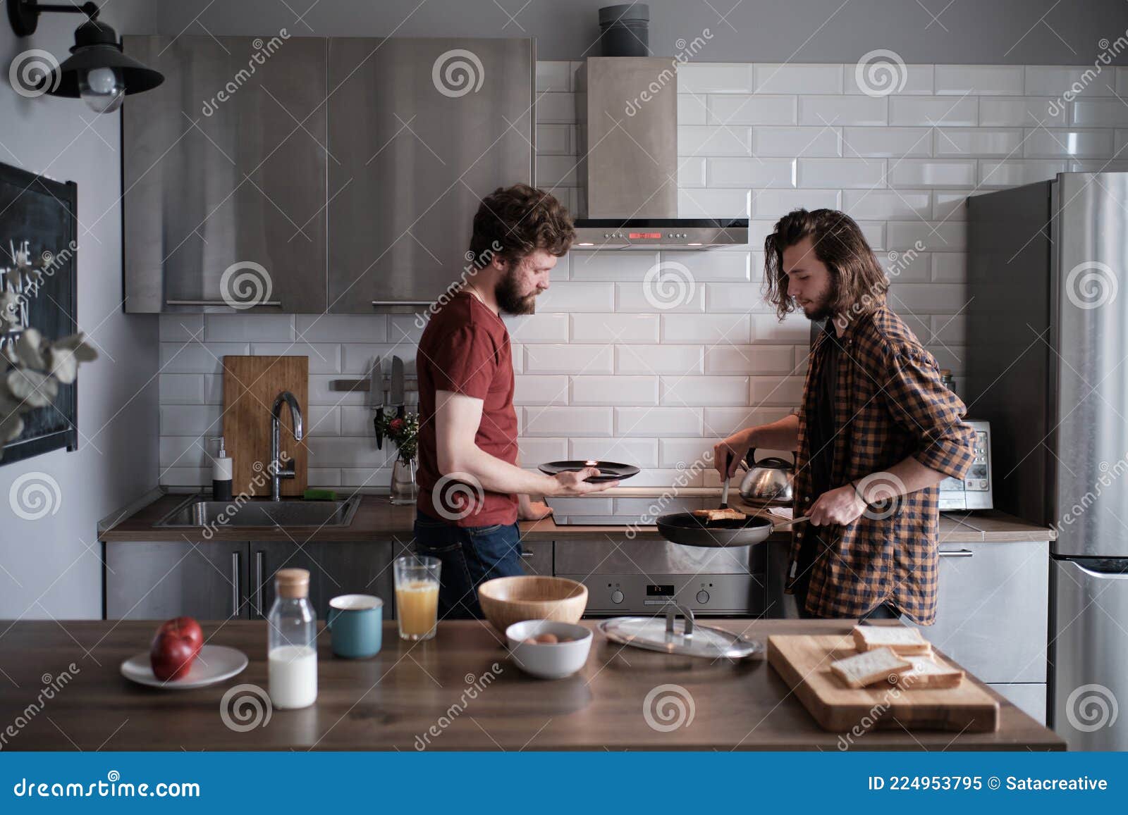 Two Men Cooking Breakfast in the Kitchen Stock Image - Image of ...