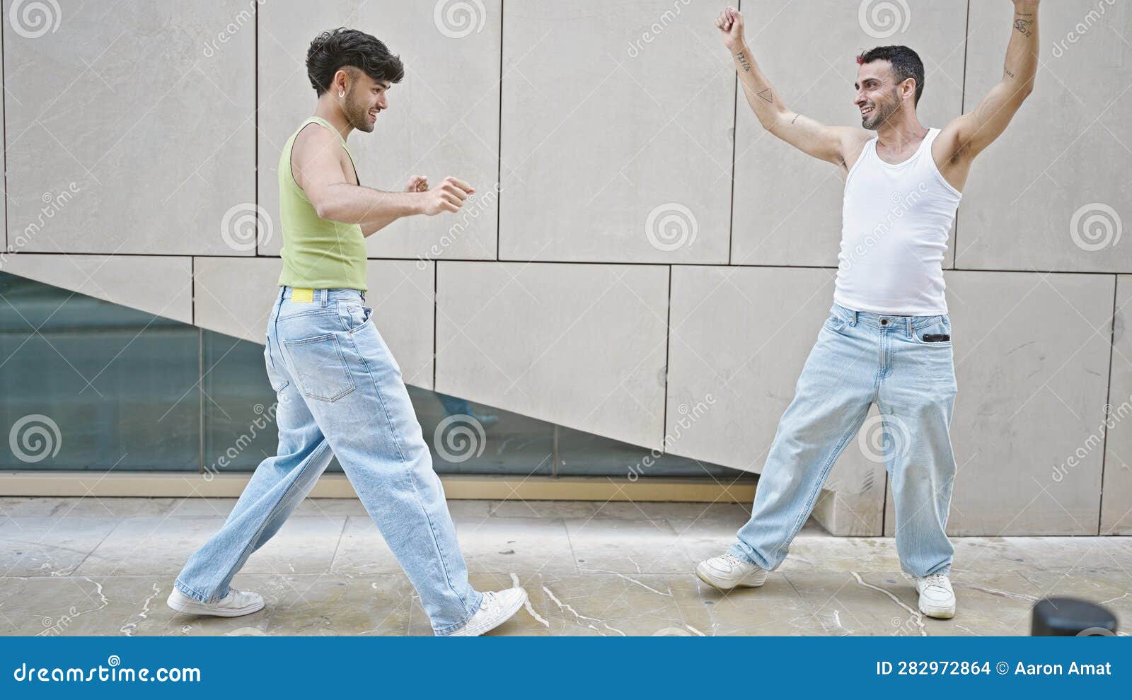 Two Men Couple Smiling Confident Dancing at Street Stock Photo - Image ...