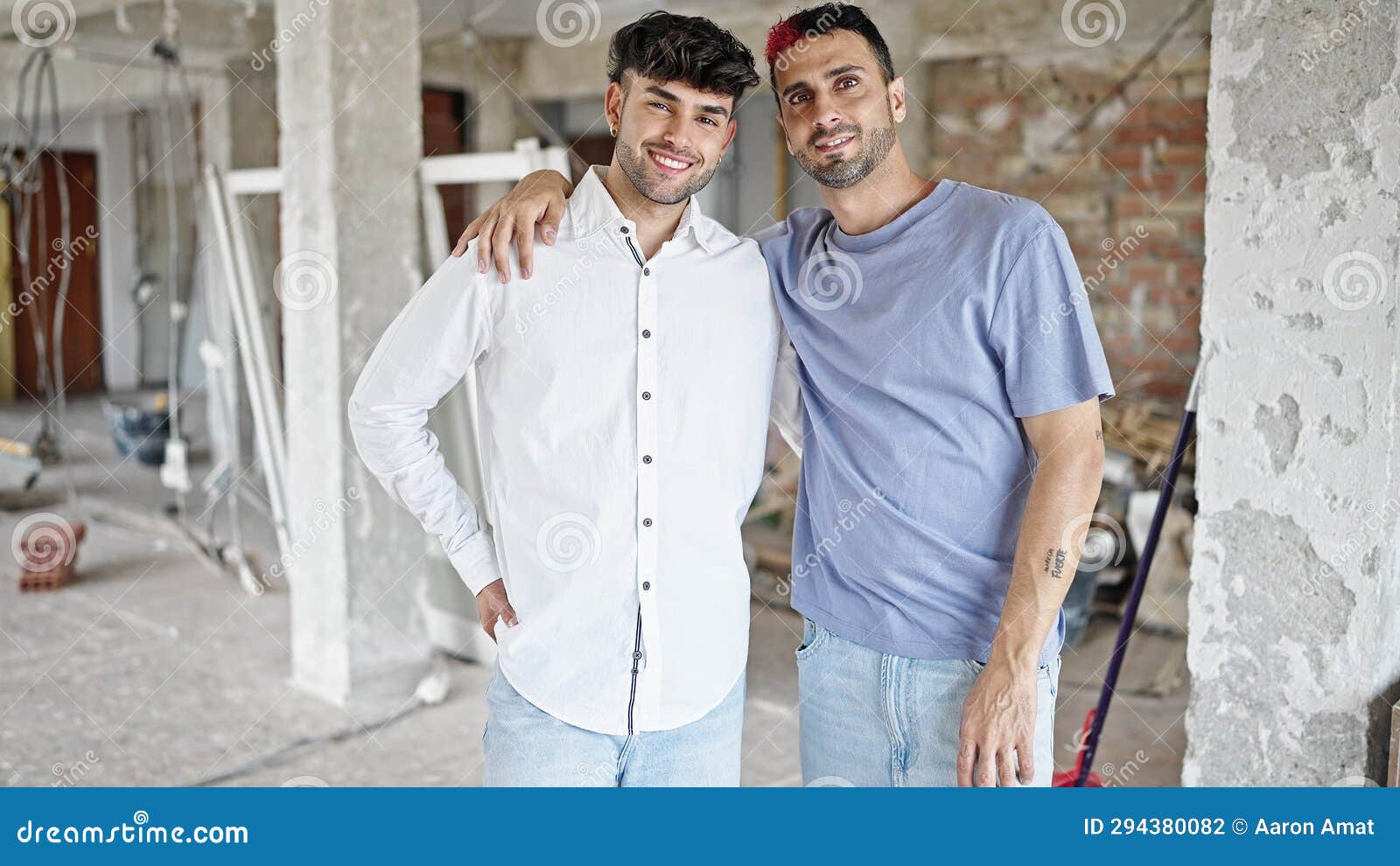 Two Men Couple Smiling Confident Hugging Each Other at Construction ...