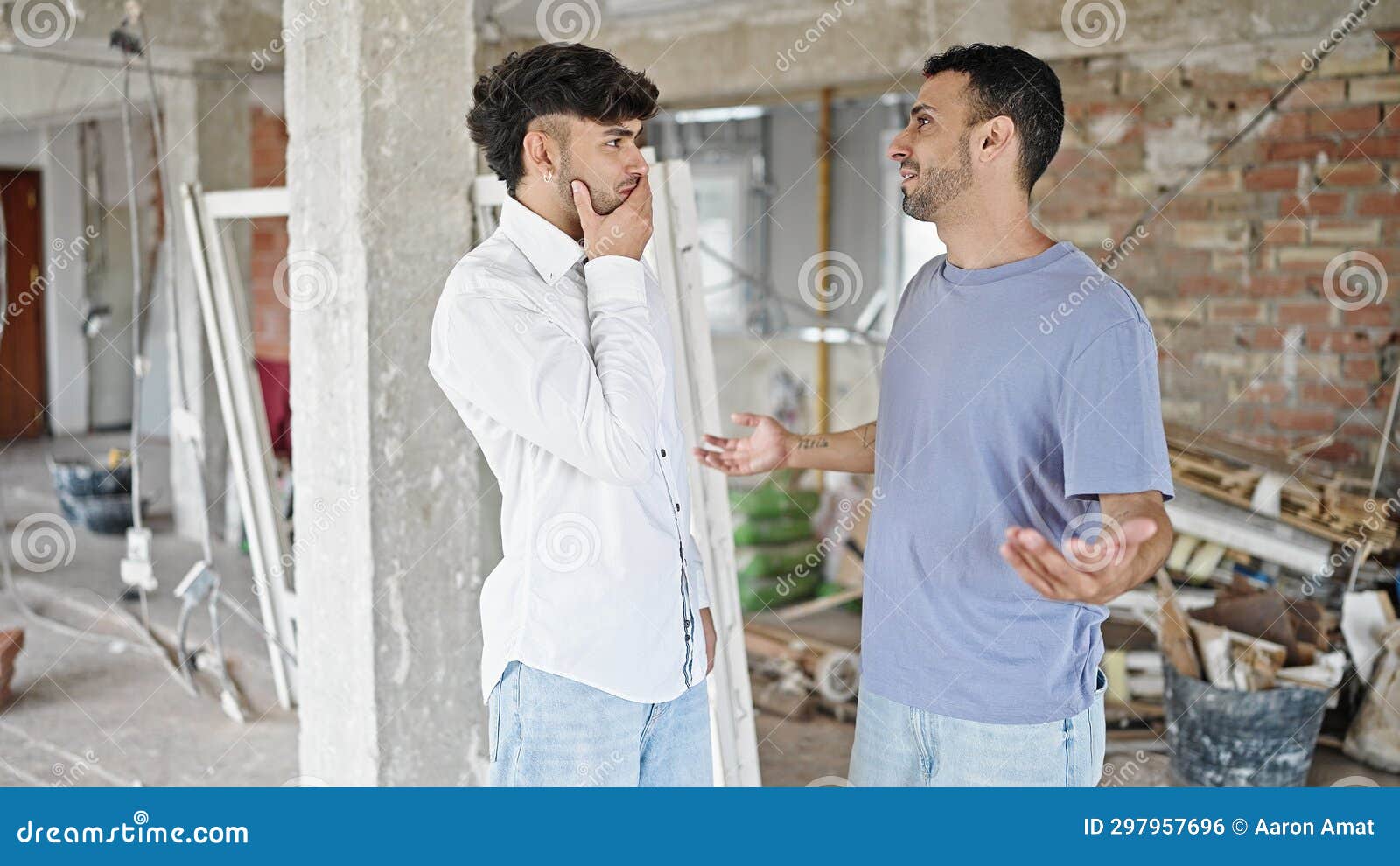 Two Men Couple Speaking at Construction Site Stock Photo - Image of ...