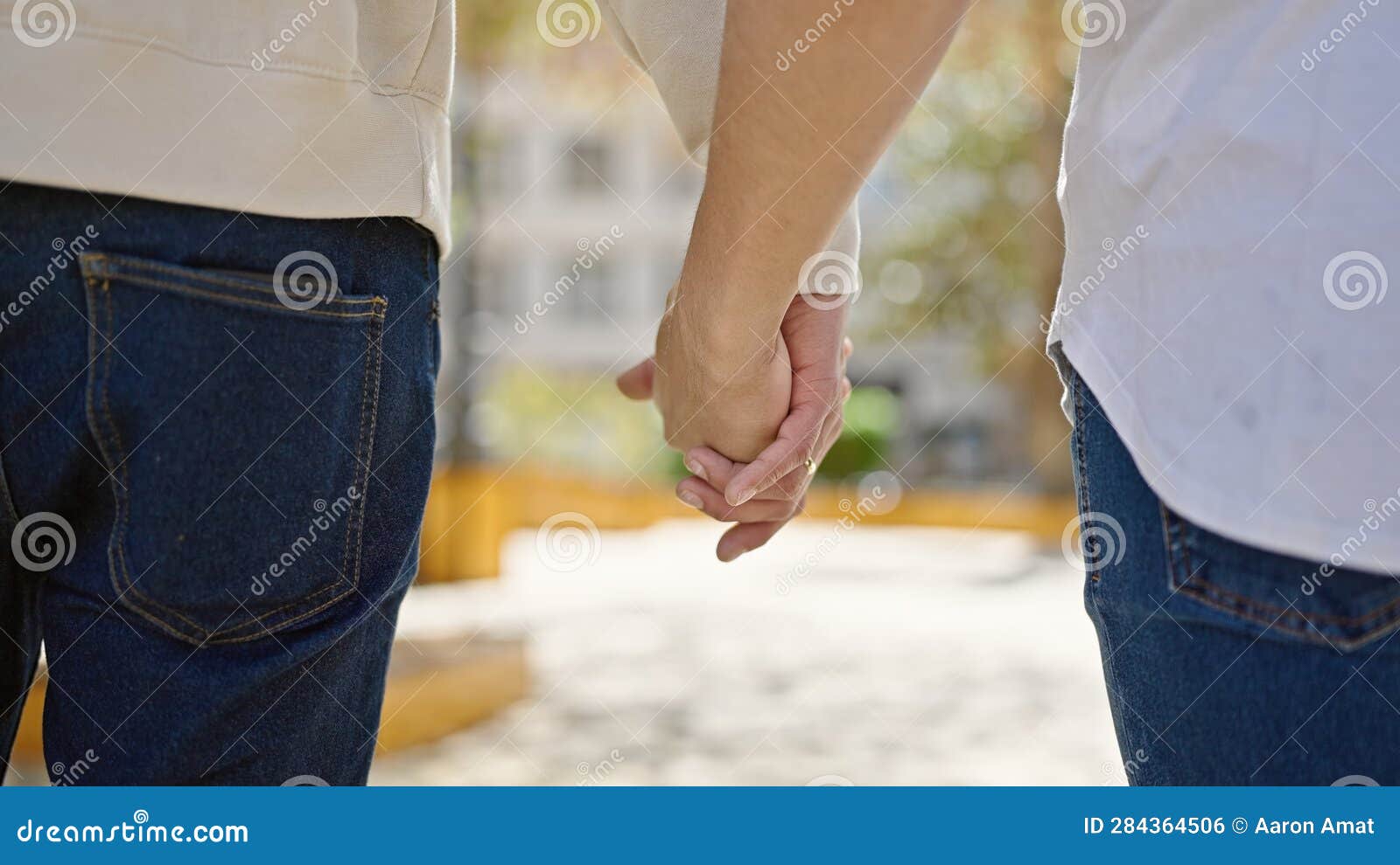 Two Men Couple Standing with Hands Together at Park Stock Photo - Image ...