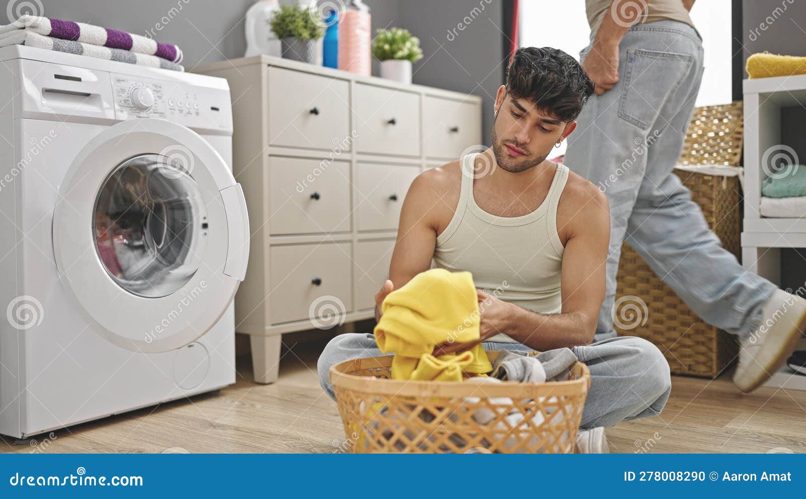 Two Men Couple Washing Clothes at Laundry Room Stock Photo - Image of ...