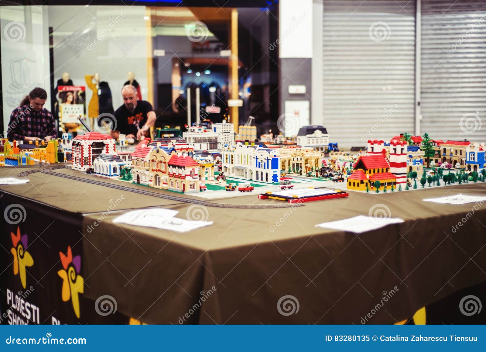 Two Men are Creating and Constructing a Lego City Editorial Image ...