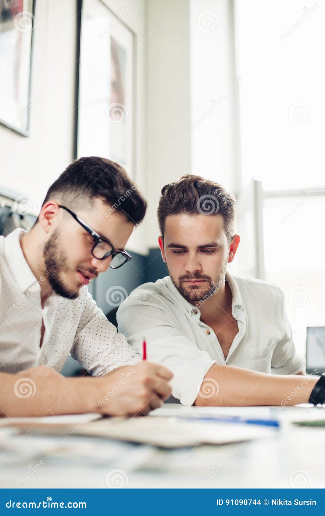 Two Men Designers Looking at Plans Stock Photo - Image of construction ...
